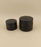 China Nice Design Black Glass Cream Jar With Screw Lid For Lotion for sale