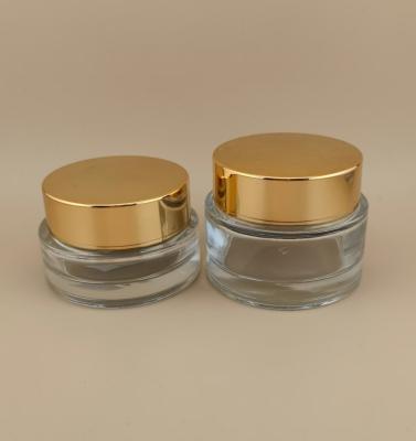 China Clear Glass Cream Jar with Golden Screw Lid For Female Lotion for sale