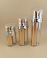 China Two-Color Golden and Silvery Airless Pump Bottle with Outer Covering for Cosmetic and Skincare Product for sale