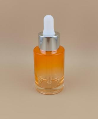 China Clear Gradual Change Orange Smooth Round Glass Dropper Bottle K-GBL30 Design For Lotion for sale