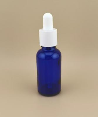 China Delicate Design Clear Dark Blue Smooth Round Dropper Bottle for Skincare for sale