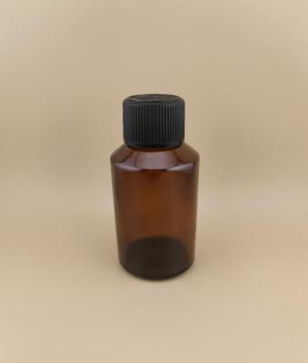 China Delicate Design Clear Brown Smooth Round Glass Bottle with Special Lid for Medicament for sale