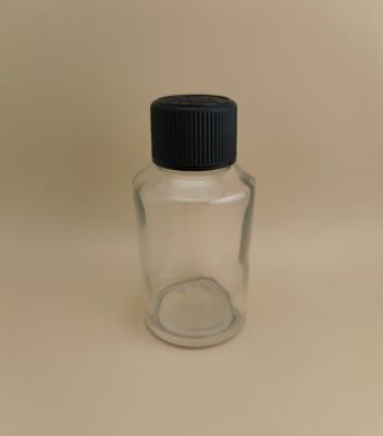 China Delicate Design Clear Smooth Round Glass Bottle with Special Lid for Medicament for sale