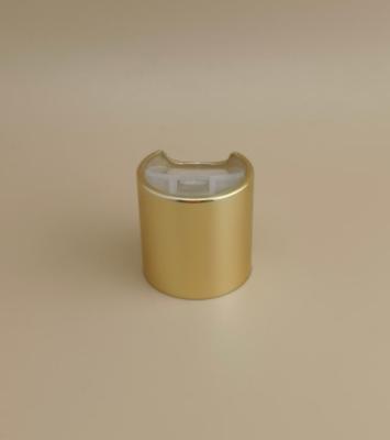 China Golden Aluminium-Plastic Round Smooth Cap with Clear Button for Skincare Bottles for sale