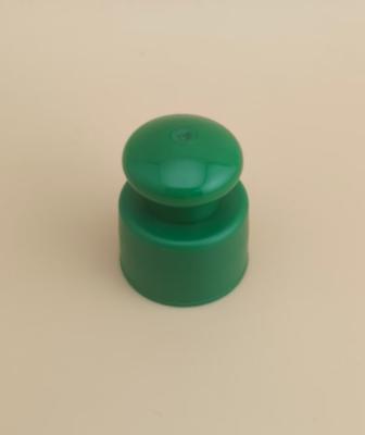China Green Plastic Smooth Cap with Button for Cosmetic Bottles for sale