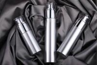 China Cosmetic Package Round Plastic Lotion Cream Empty Airless Bottle with Pump Head for sale