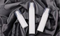 China Cosmetic Package Round Plastic Lotion Cream Empty Airless Bottle with Pump Head for sale
