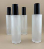 China Matte Transparent Glass Bottle with Black Treatment Pump for Cosmetic for sale