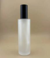 China Matte Transparent Glass Bottle with Black Treatment Pump for Cosmetic for sale