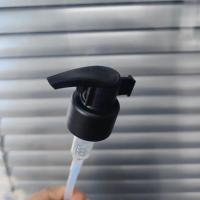 China New Design 24mm 28mm Plastic Lotion Pump with Left-Right Lock Twist Lotion Pump with Clip for sale