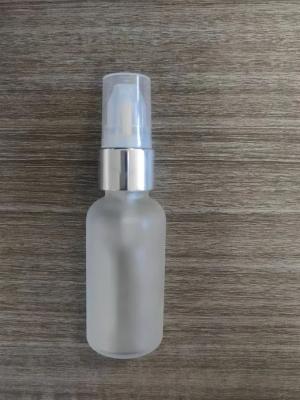 China Colorful Glass Bottle with Cream Pump for sale