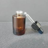 China Custom Luxury Clear Empty Glass Bottle Custom Color 15ml Essential Oil Dropper Bottle for sale