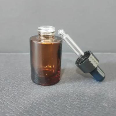China Custom Luxury Clear Empty Glass Bottle Custom Color 15ml Essential Oil Dropper Bottle for sale