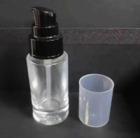 China Makeup Package Skin Care Lotion Bottle Cylinder Round Glass Pump Bottles for Skincare for sale