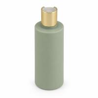 China Golden Aluminium-Plastic Round Smooth Cap with Clear Button for Skincare Bottles for sale