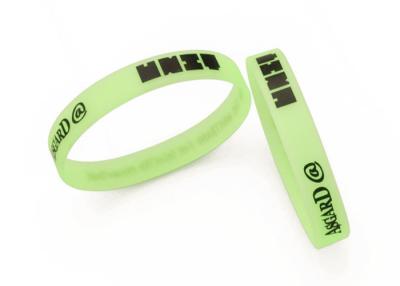 China Custom Glow in the Dark Silicone Wristband 202x12mm Green Blue Red Light for sale