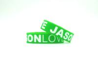 China Custom Logo Silicone Sports Bracelets 250x12x2mm White Brown Rubber Wristbands for sale