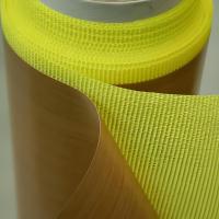 China Brown PTFE Fiberglass Tape With Yellow Release Paper 260℃ High Temperature Resistance Fiberglass Reinforced Non-stick Teflon Cloth Tape for sale
