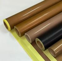 China Brown PTFE Fiberglass Tape With Yellow Release Paper 260℃ High Temperature Resistance Fiberglass Reinforced Non-stick Teflon Cloth Tape for sale