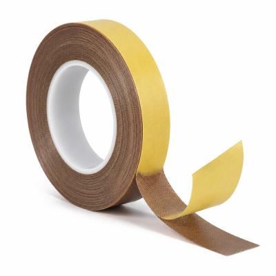 China Brown PTFE Tape with Release Liner / Liner-Backed PTFE Tape / PTFE Glass Cloth Tape with Silicone Adhesive and Yellow Release Paper for Die Cutting, Heat Sealers and Guides for sale