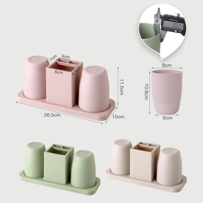 China Toothbrush Holder and Large Toothpaste Stand Organizer Plastic Storage Rack Set Bathroom Accessories for Family, Kids. for sale