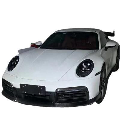 China Auto Parts for Porsche 911 992 Carbon Fiber Body Kit 911 992 Upgraded Bras-style Front Shovel Diffuser Spoiler Body Kit for sale