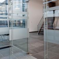 China Steel Main Material Finished Surface Customized Aluminium Soundproof Frameless Glass Door for sale