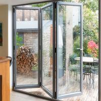 China Double Glass Accordion Design Aluminium Folding Doors For Modern Large Bi Folding Patio for sale