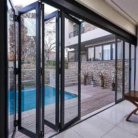 China Double Glass Accordion Design Aluminium Folding Doors For Modern Large Bi Folding Patio for sale