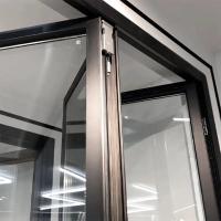China Aluminum Alloy Modern Style Waterproof Bifold Doors For Balcony Glass Windows for sale