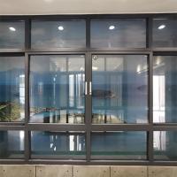 China Double Glazed Aluminium 3 Tracks Sliding Windows With Stainless Steel Screen Netting for sale