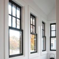 China Vertical Sliding Tempered Glass Double Hung Windows With Stainless Steel Screen Netting for sale