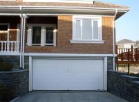 China Modern Design And Functionality Electric Garage Doors For Residential Settings for sale