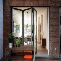 China High Quality Double Glazed Aluminum Bi Folding Waterproof Doors For Modern House for sale