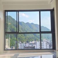 China Modern Design 3 Track Sliding Window with Handle Lock and Mesh Screen for Kitchen & Houses for sale