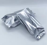 China Glossy Silver Aluminum Foil Laminated Heat Seal Back Sealing Side Gusset Food Packaging Pouch Coffee Bean Bags for sale
