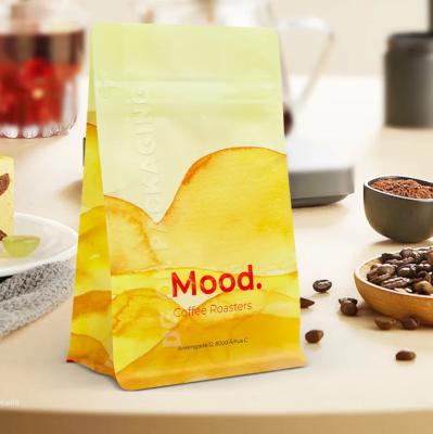 China Custom Logo Side Gusset Flat Bottom Coffee Beans Packaging Laminated 100g 150g 250g 500g 1kg Bags With Valve for sale
