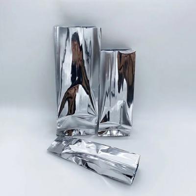 China Glossy Silver Aluminum Foil Laminated Heat Seal Back Sealing Side Gusset Food Packaging Pouch Vacuum Food Tea Coffee Bean Bags for sale