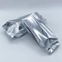 China Glossy Silver Aluminum Foil Laminated Heat Seal Back Sealing Side Gusset Food Packaging Pouch Vacuum Food Tea Coffee Bean Bags for sale