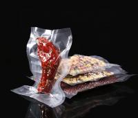 China Wholesale 3 Side Sealed Vacuum Packing Bag Factory Price Food Grade Nylon Retort Pouch For Frozen Food With Tear Notch for sale
