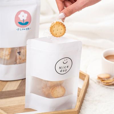 China Eco-Friendly Packaging For Coffee Beans Tea Food Snacks Kraft Paper Clear Stand-Up Resealable Zip Lock Custom Logo for sale