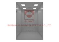 China 5000kg T Guide 0.25m/S Warehouse Goods Elevator Lift Center Opening Door for sale