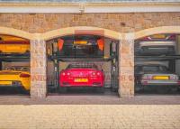 China 60fpm 2955Kg Vehicle Auto Parking Lift Stainless Steel Cab Walls for sale