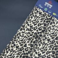 China 9.7oz Printed Denim Fabric Stretch Cotton Blend Leopard Print Denim Fabric For Jeans And Clothing for sale
