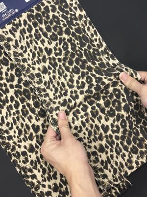 China 9.7oz Printed Denim Fabric Stretch Cotton Blend Leopard Print Denim Fabric For Jeans And Clothing for sale