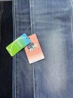 China Dark Blue+Green 4-Way Stretch Vertical Slub Denim Fabric with 8S Warp Slub and 25% Lyocell Blend for sale