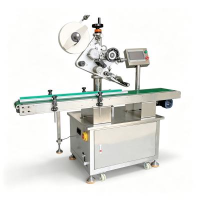 China PLC Touch Screen Automatic Labeling Machine High Precision Flat Labeling Machine For Carton Labeling for sale