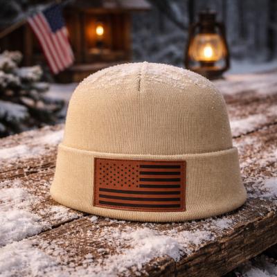 China Custom Knit Beanie with Leather Patch – Warm Winter Hat | USA Flag Beanie | Soft Acrylic Cuffed Beanie for Outdoor & Streetwear for sale