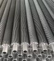 China DELLOK 32mm Helical Fin Tube 3.3mm Serrated for Boiler Coolers | SA213-TP304H Stainless Steel for sale