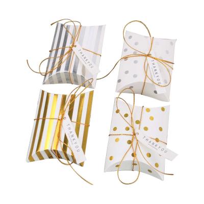 China 250g White Cardboard Biodegradable Paper Food Packaging Pillow Candy Box Iron Golden for sale